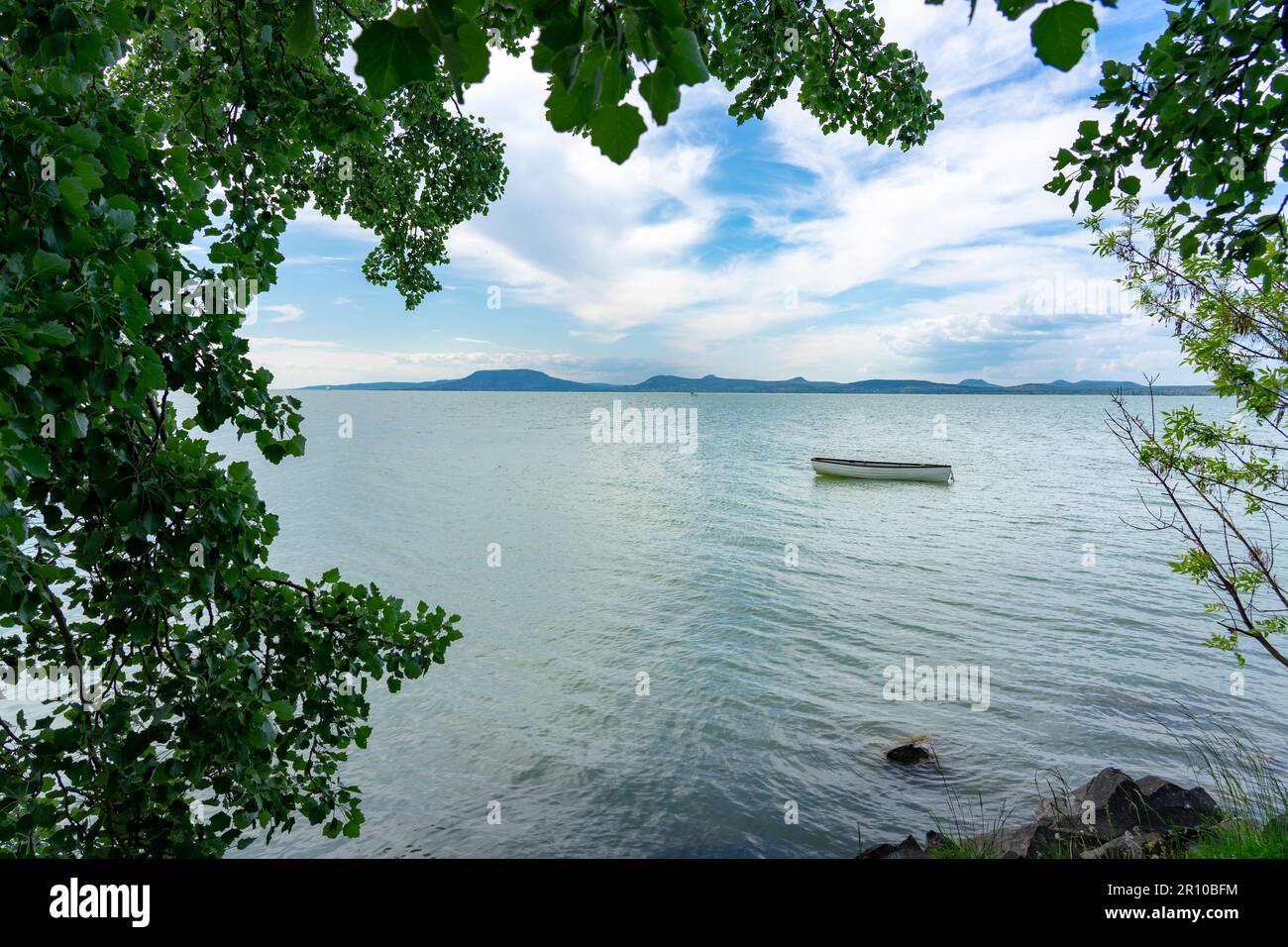 boat on Lake Balaton with Badacsonyhill background in Balatonlelle with ...