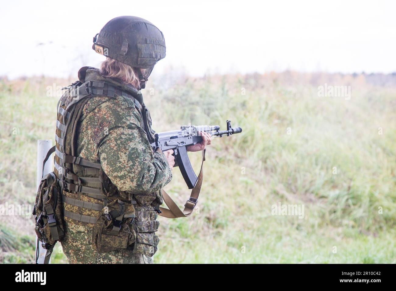 Man shooting at a target. Unformal shooting range Stock Photo - Alamy