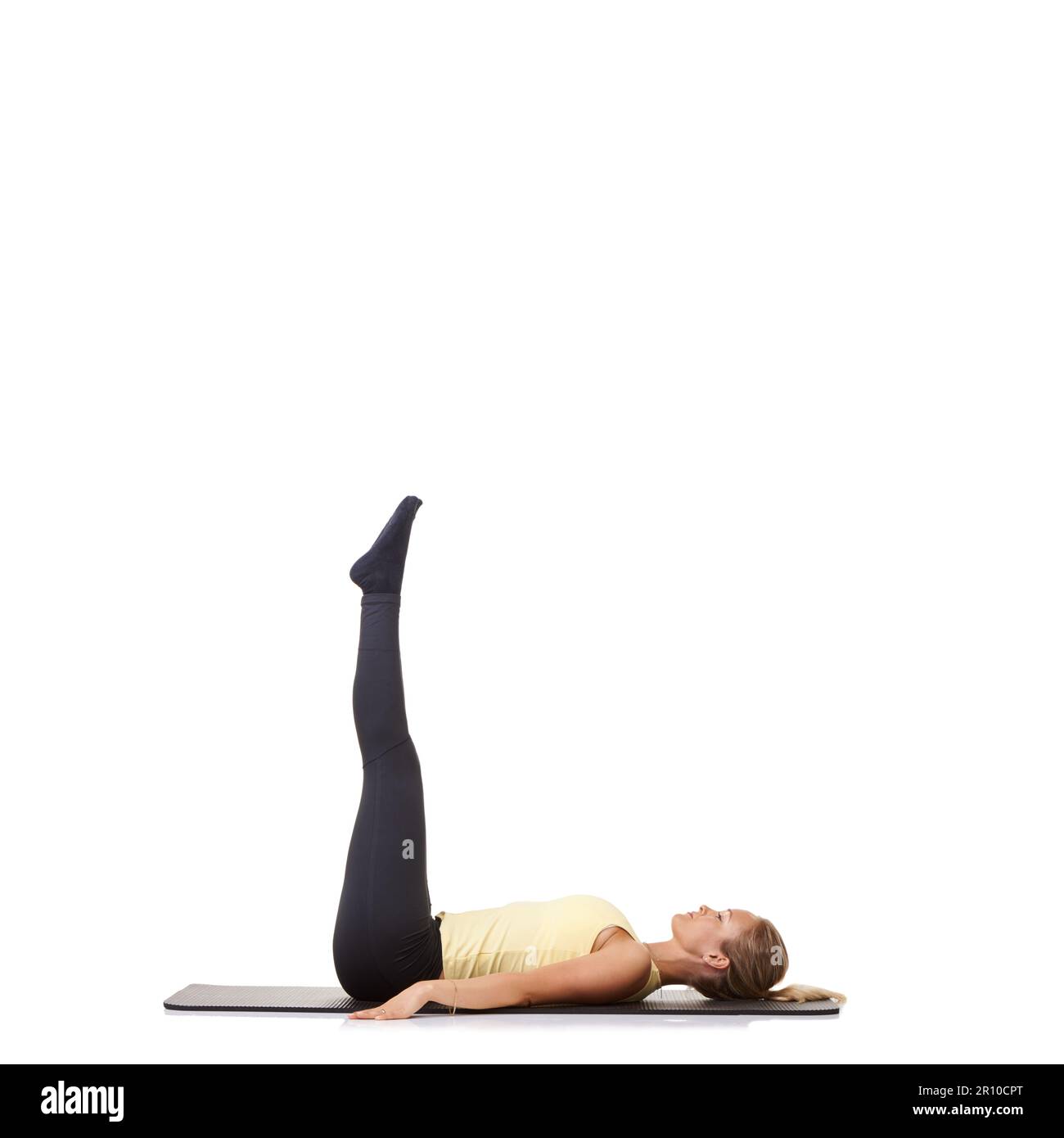 Her technique is perfect - Fitness Instructor. A fit young woman lying ...