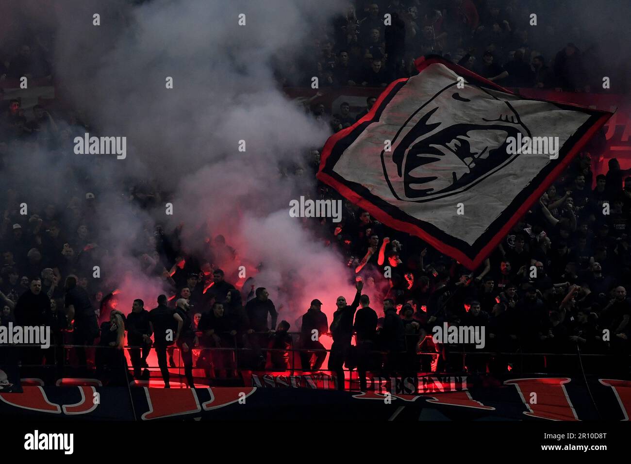 Milan, Italy. 10th May, 2023. Milan supporters light smoke bombs and ...