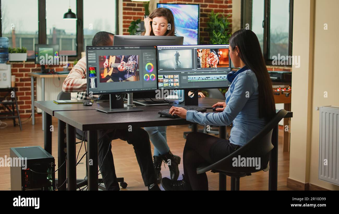 Videography expert editing video footage in post production agency ...