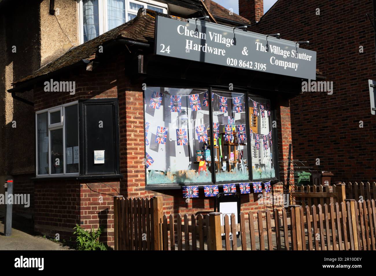 Cheam Village Hardware Store with Bunting in Window Celebrating King ...