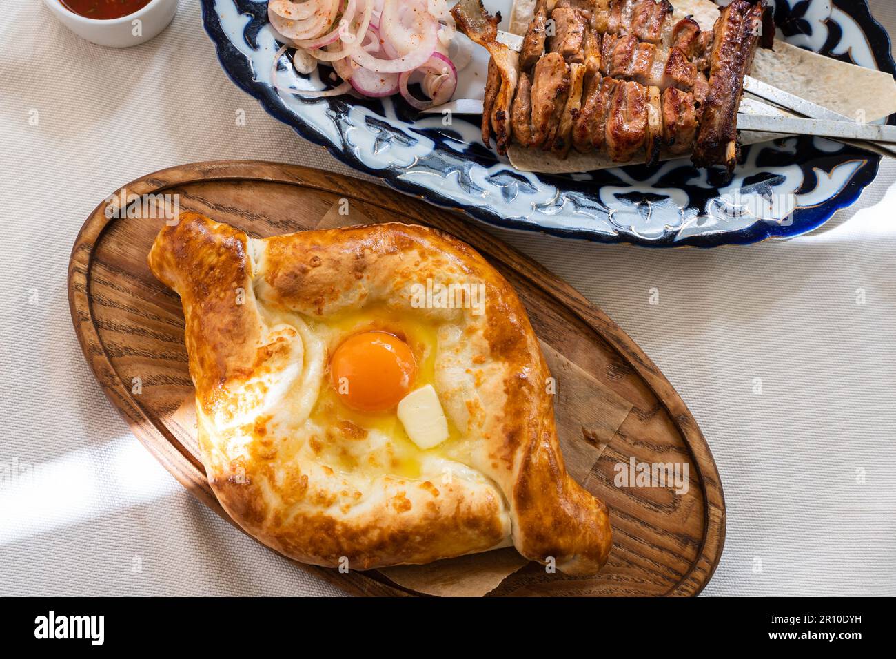 Traditional Georgian cuisine. Caucasian khachapuri cakes in Adjarian ...