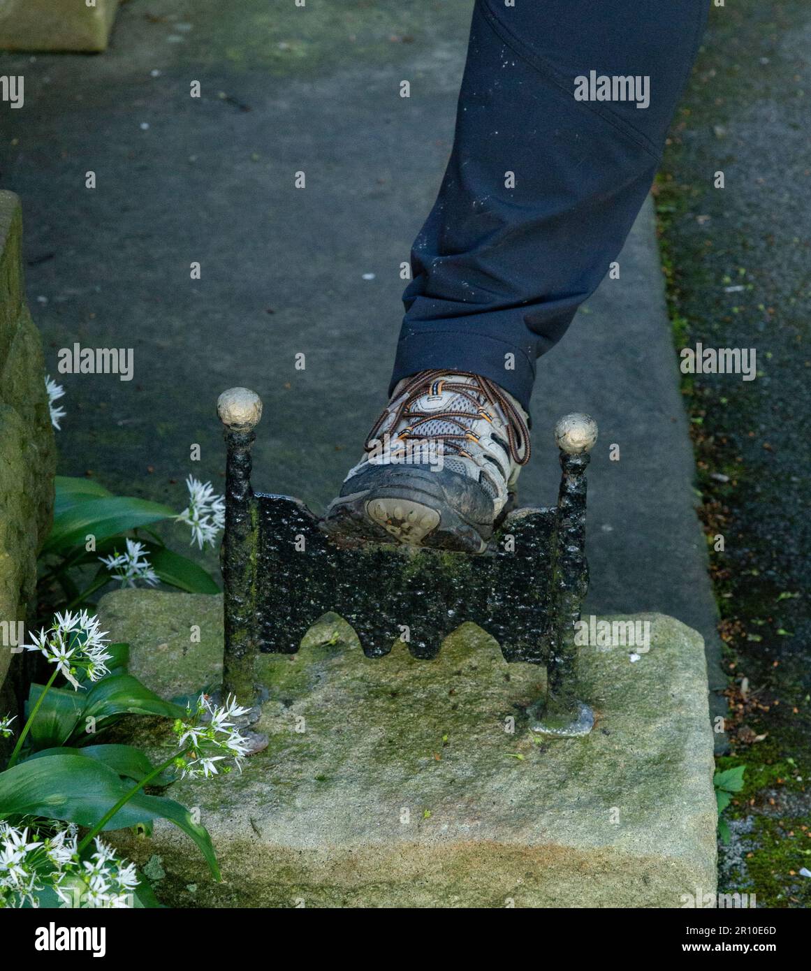 Male foot in boot scraper hi-res stock photography and images - Alamy