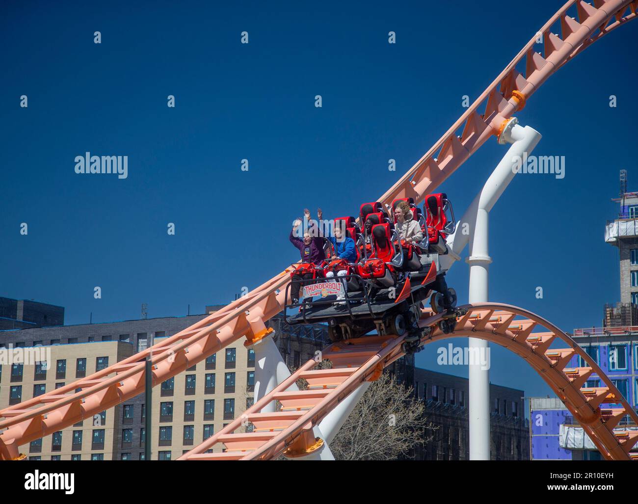 Riders on a roller coaster in Coney Island, NY Stock Photo - Alamy