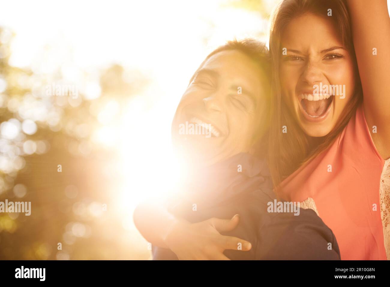 Living life to the full. An excited couple enjoying life against a ...