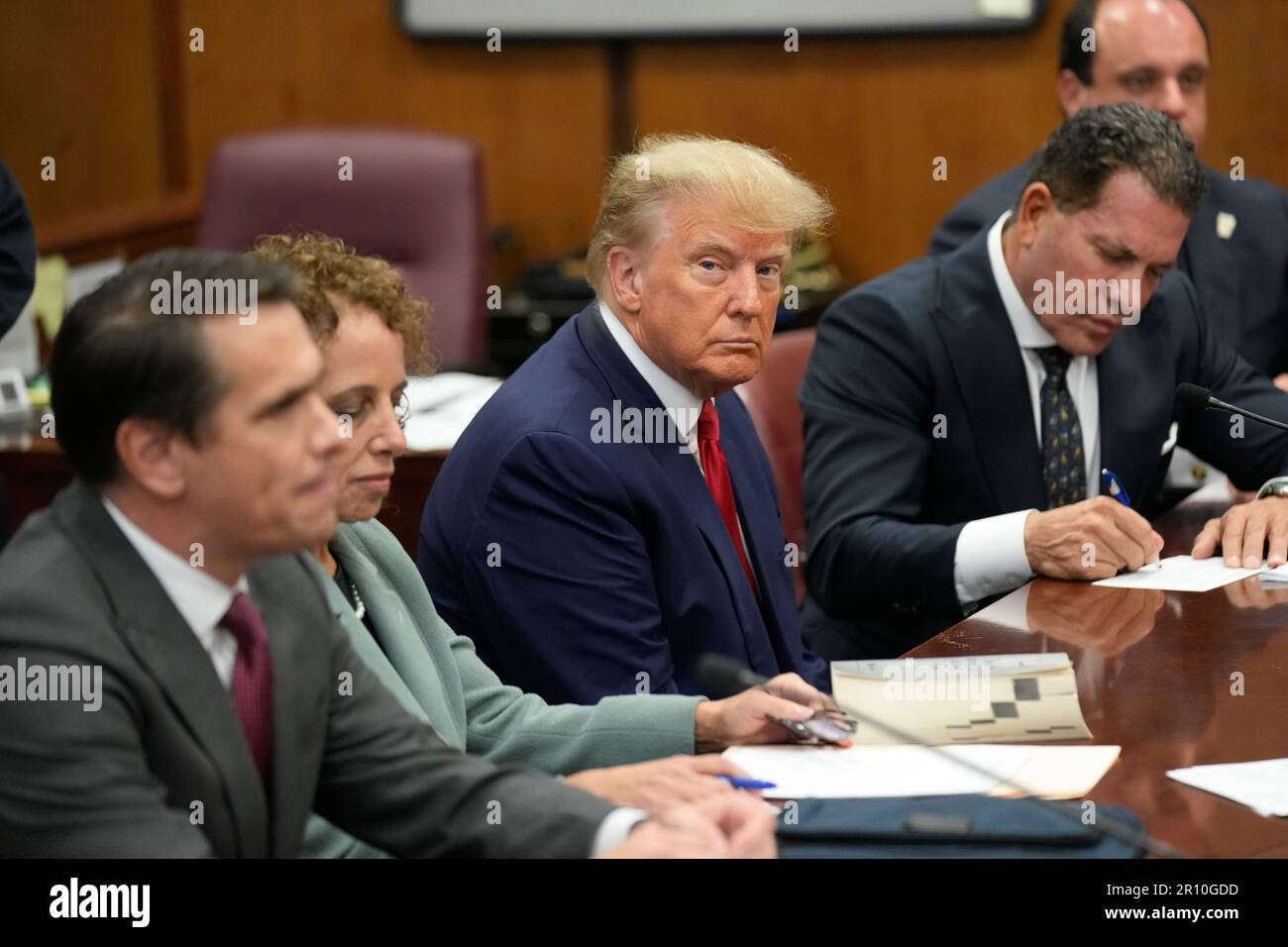 FILE - Former President Donald Trump sits at the defense table with his ...