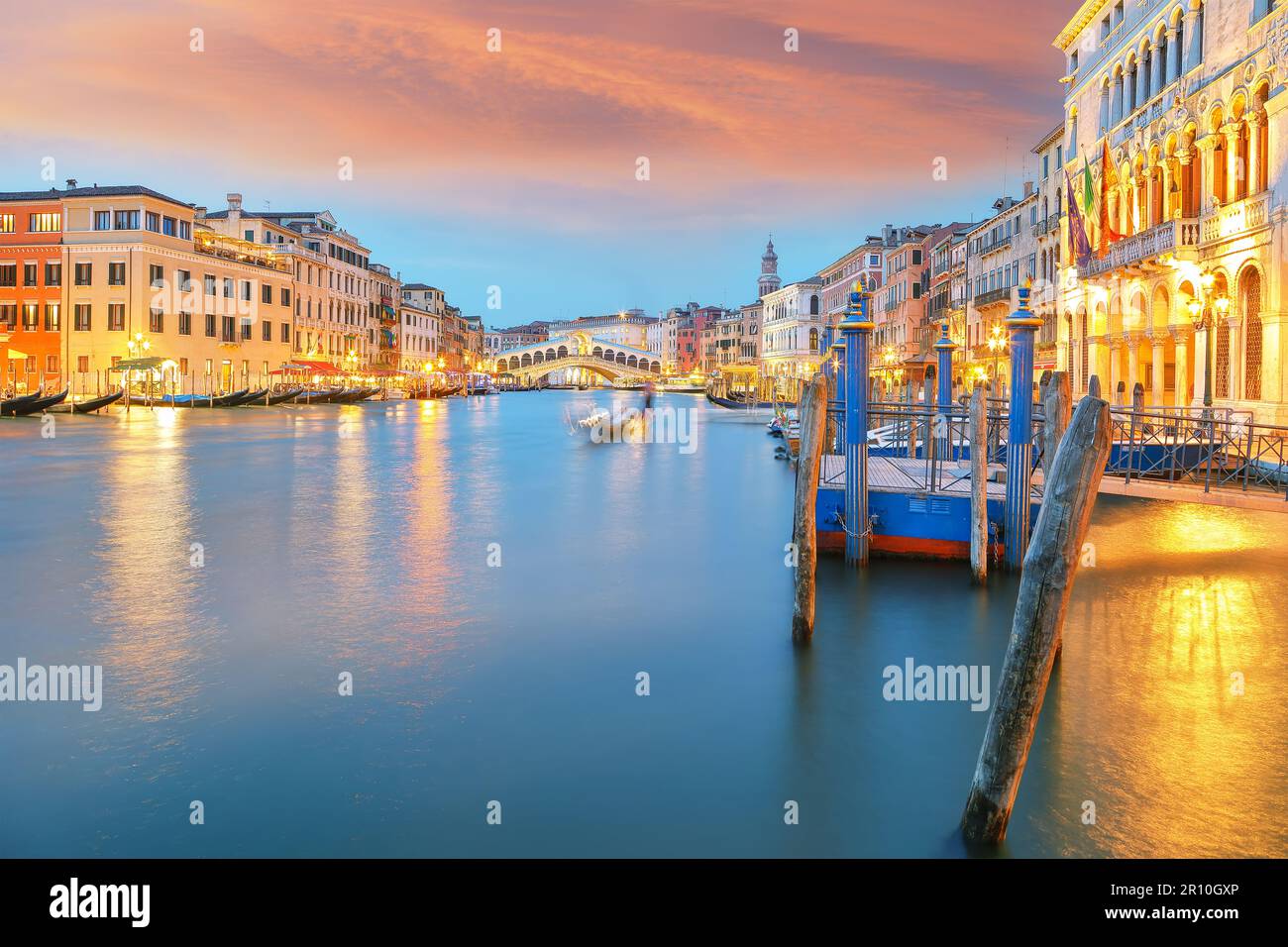 Amazing sunset and evening cityscape of Venice with famous Canal Grande ...