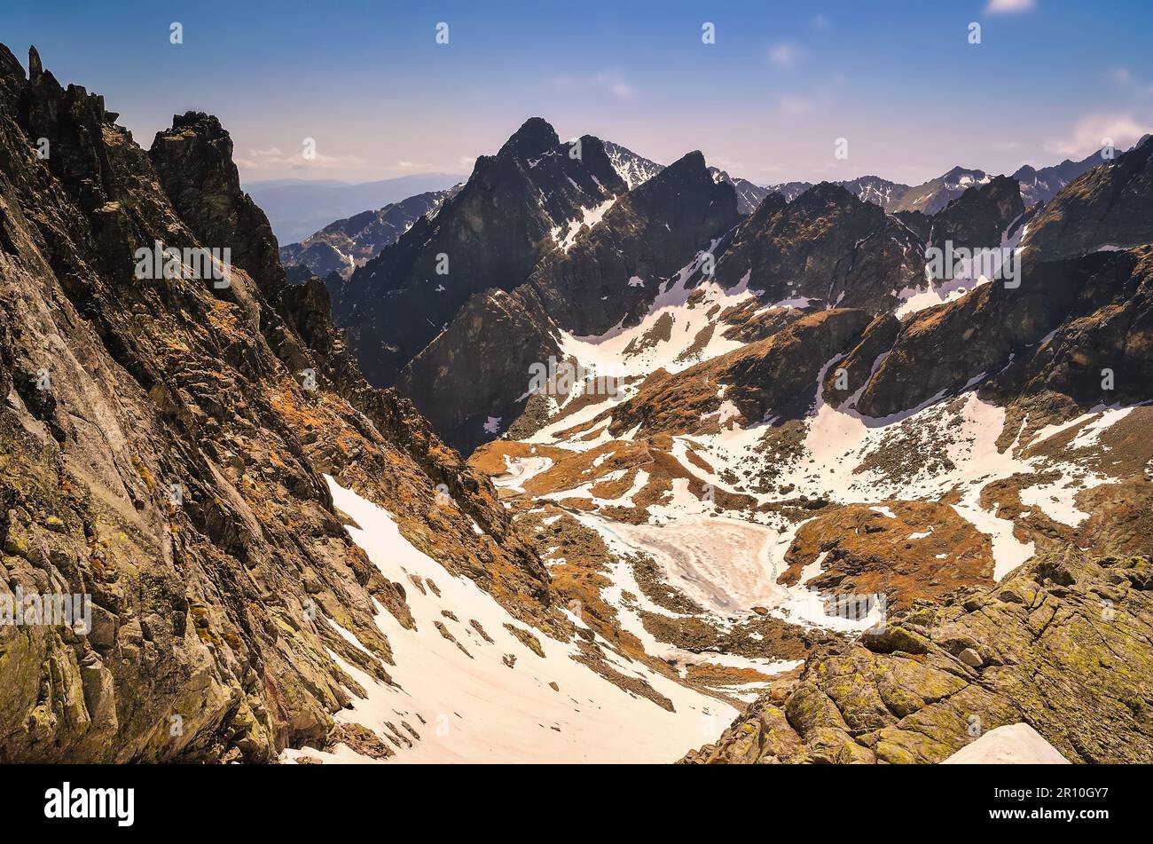 Early spring mountain landscape. Picturesque view stretches over frozen ...