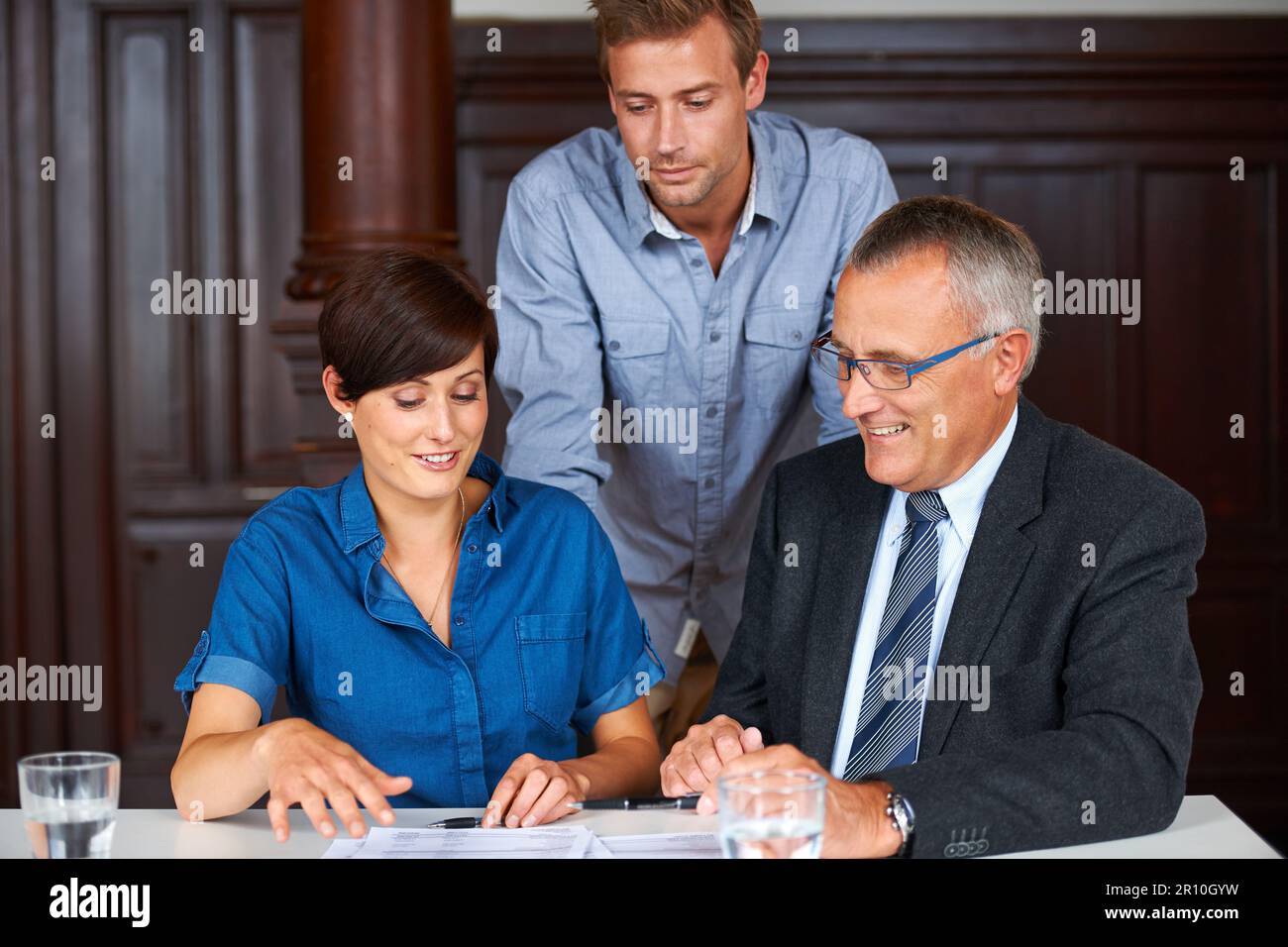 Going over her contract. a business meeting in progress Stock Photo - Alamy