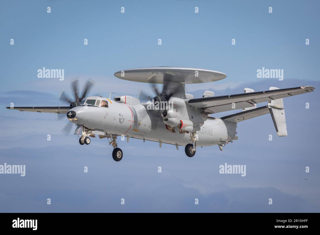 French Navy Rafales taking off, and French Navy Grumman E-2C Hawkeye ...