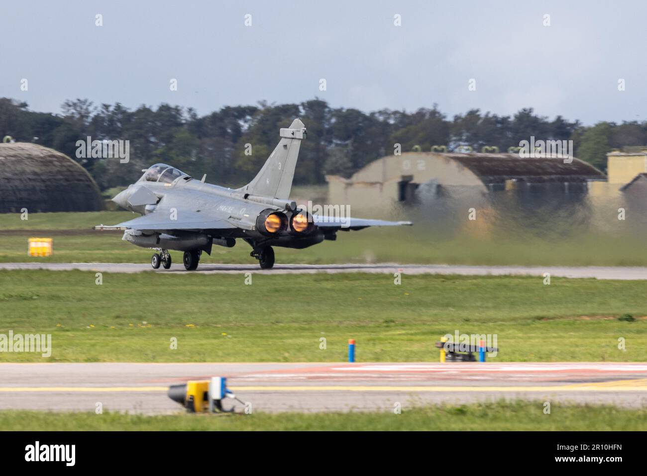 French Navy Rafales taking off, and French Navy Grumman E-2C Hawkeye ...
