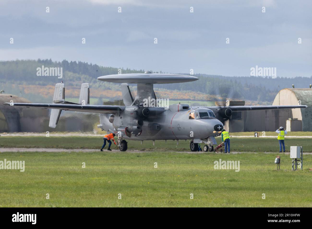 French Navy Rafales taking off, and French Navy Grumman E-2C Hawkeye ...