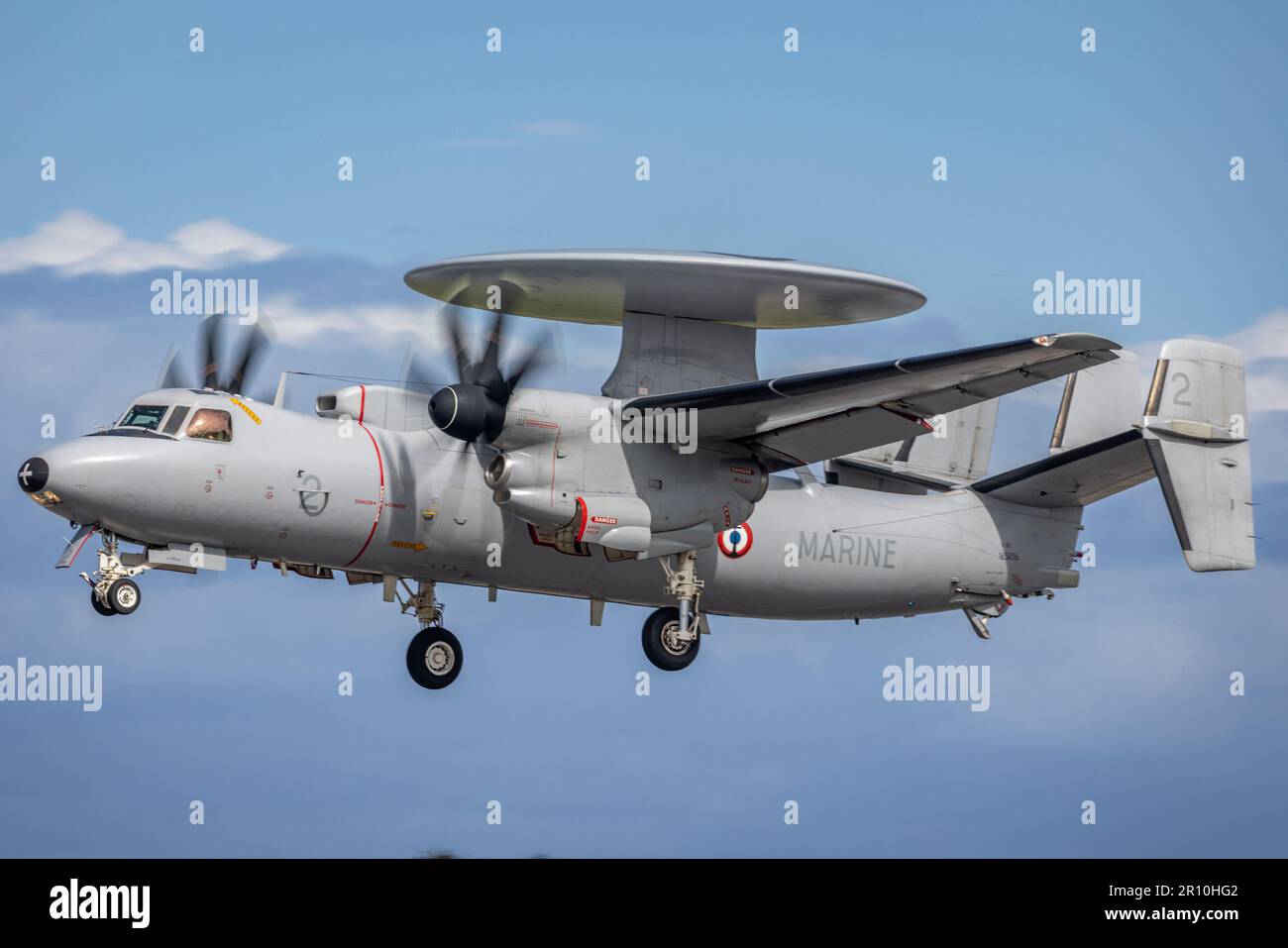French Navy Rafales taking off, and French Navy Grumman E-2C Hawkeye ...