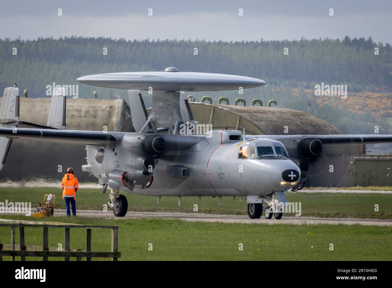 French Navy Rafales taking off, and French Navy Grumman E-2C Hawkeye ...