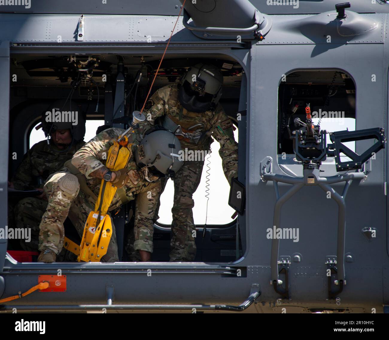 Tech Sgt. Forrest Bruch helps Master Sgt Michael Wright, Air Force ...