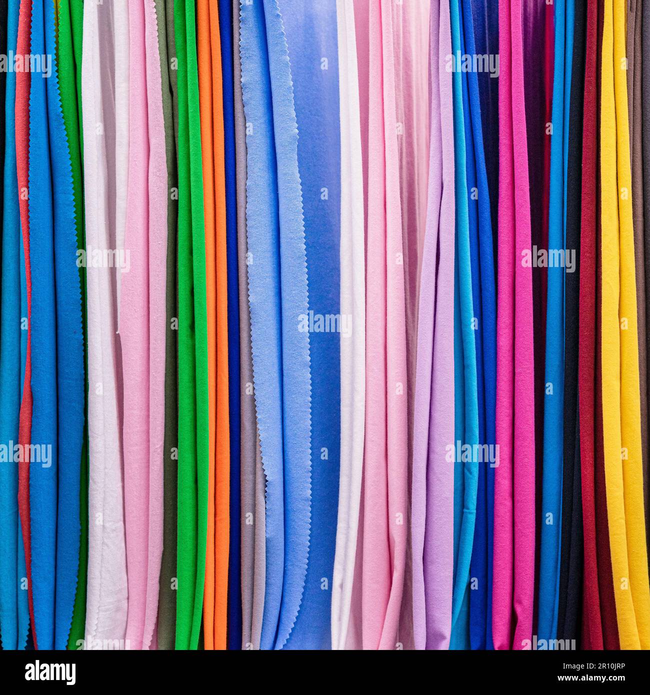 Rainbow colors of samples bright fabrics. Choice of decorative textiles ...