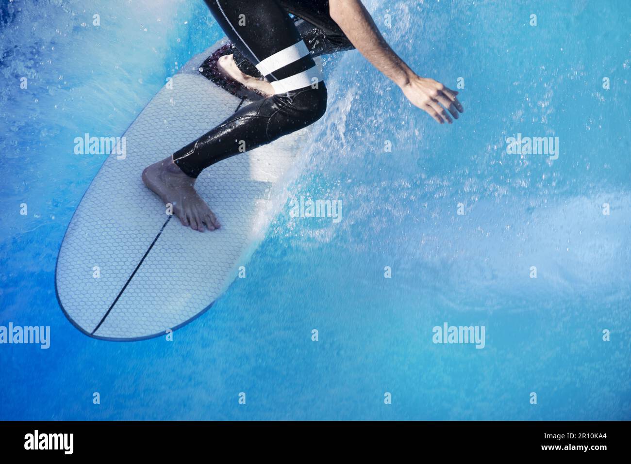 A surfer practicing in a wave pool Stock Photo - Alamy