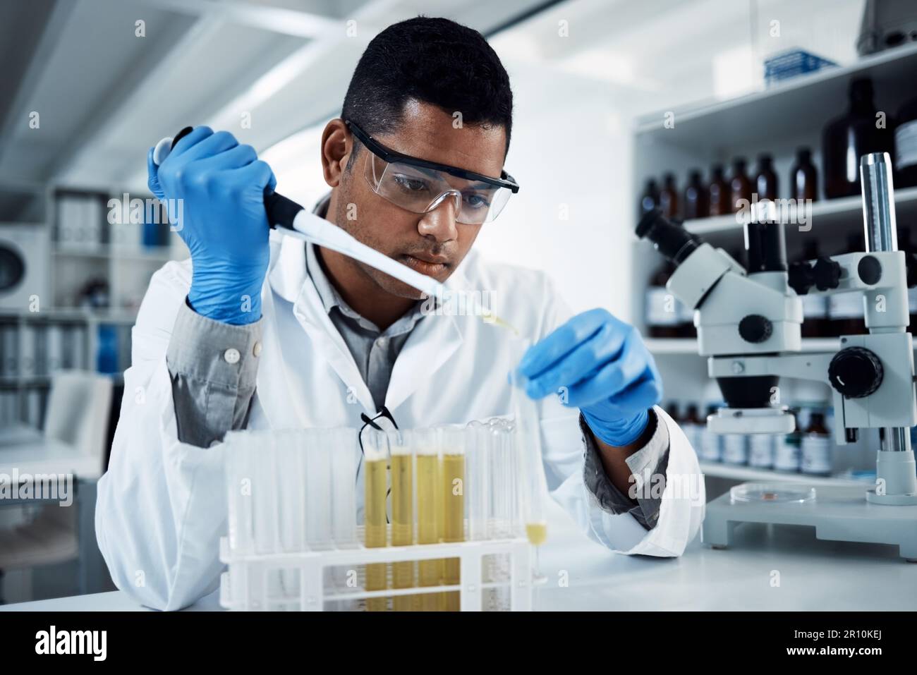 If youre cured, you can thank a scientist. a young scientist conducting ...