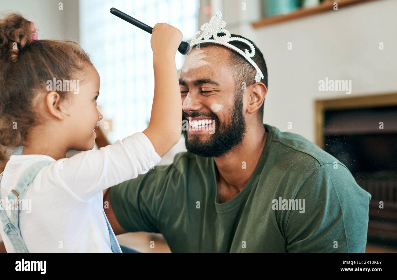 Making dad look like a real princess. a little girl putting makeup on ...