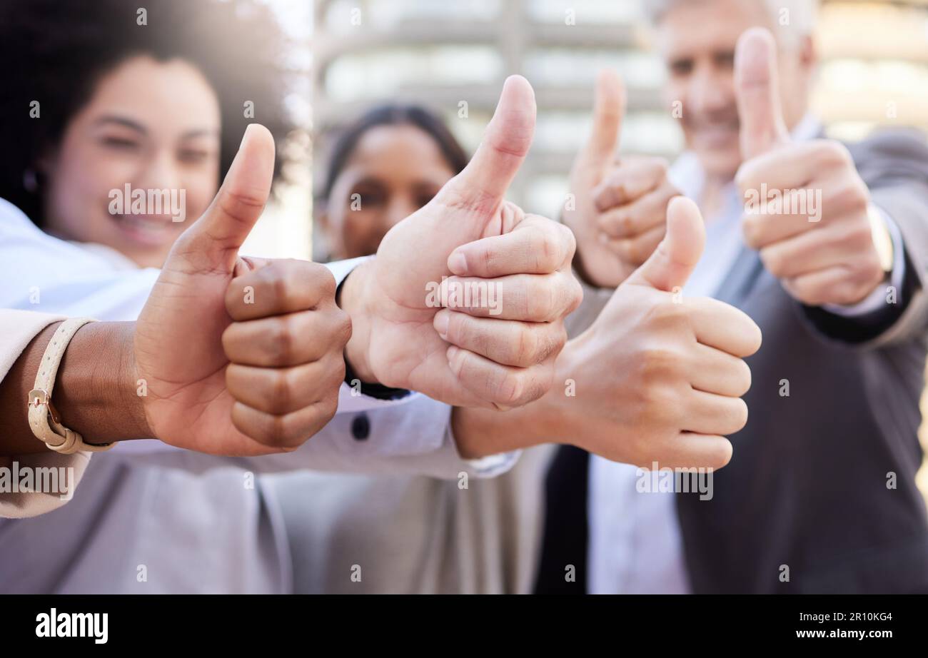 Were always winning. a diverse group of businesspeople standing outside ...