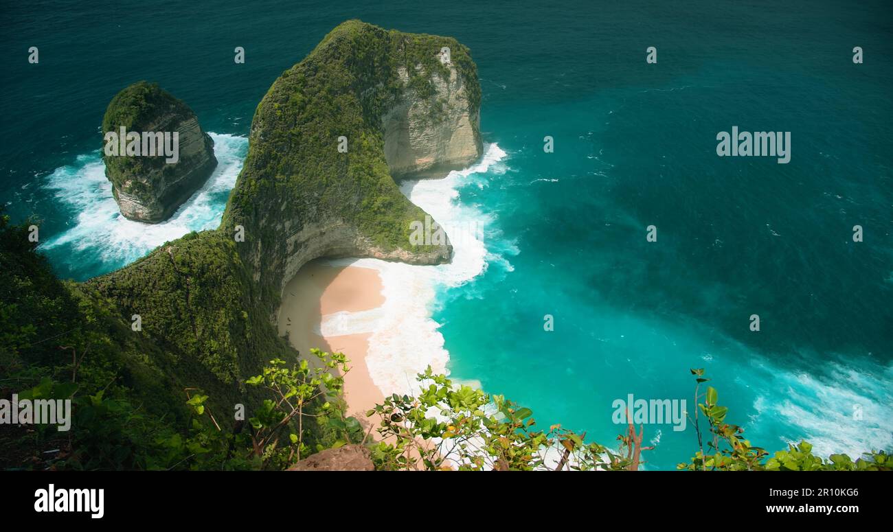 Green cape on tropical Island Bali Kelingking Beach Indonesia. Azure ...