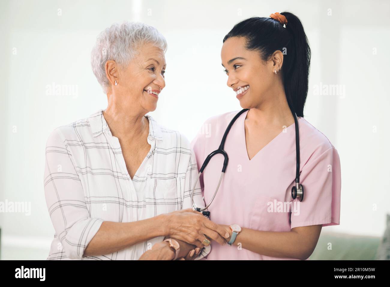 Elderly hispanic woman with caregiver hi-res stock photography and ...