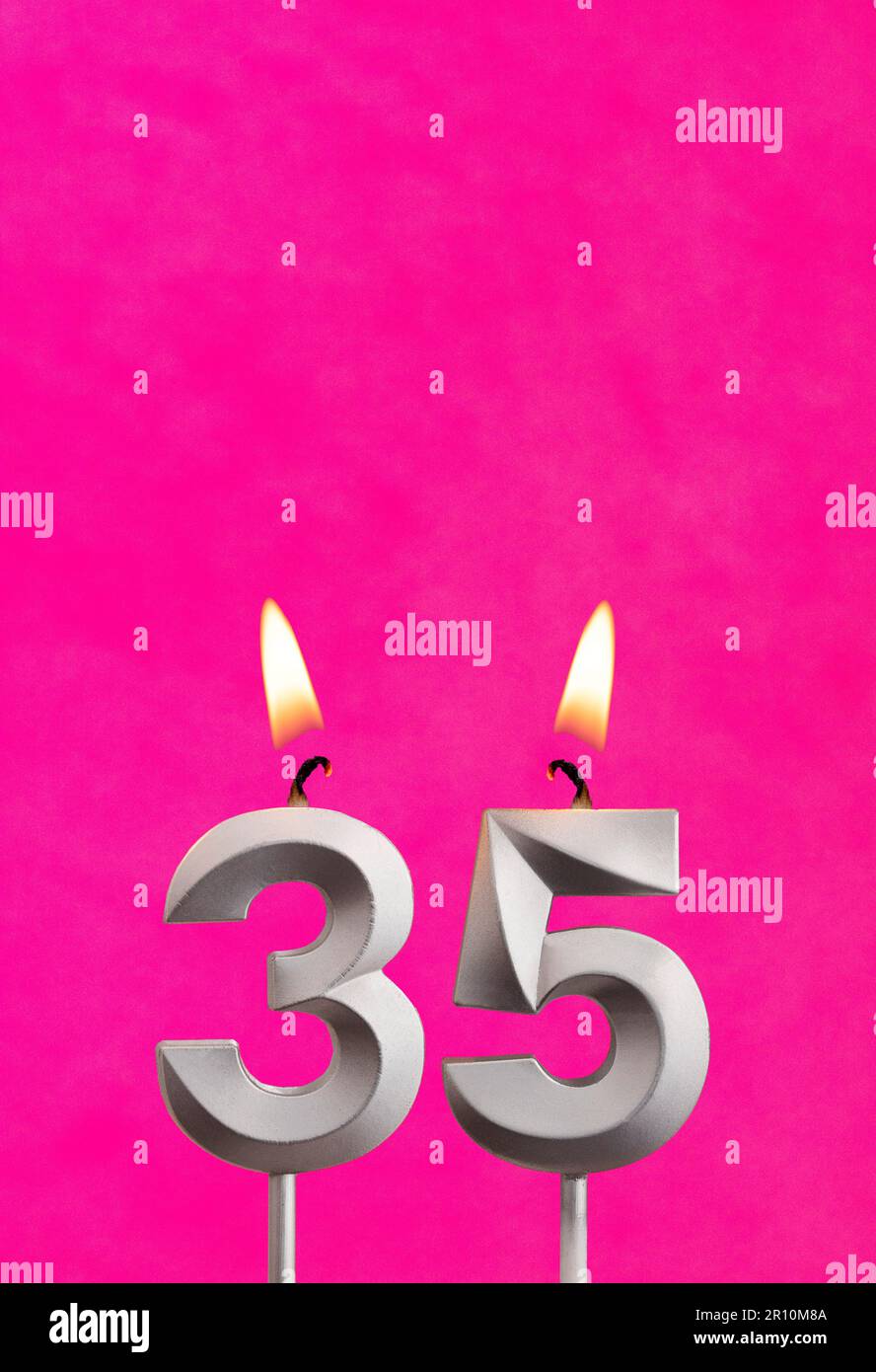 Number 35 candle - Birthday celebration on fuchsia background Stock ...