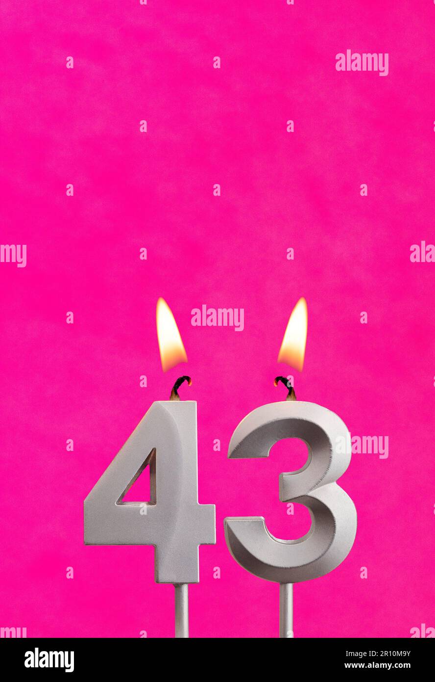 Number 43 candle - Birthday celebration on fuchsia background Stock ...