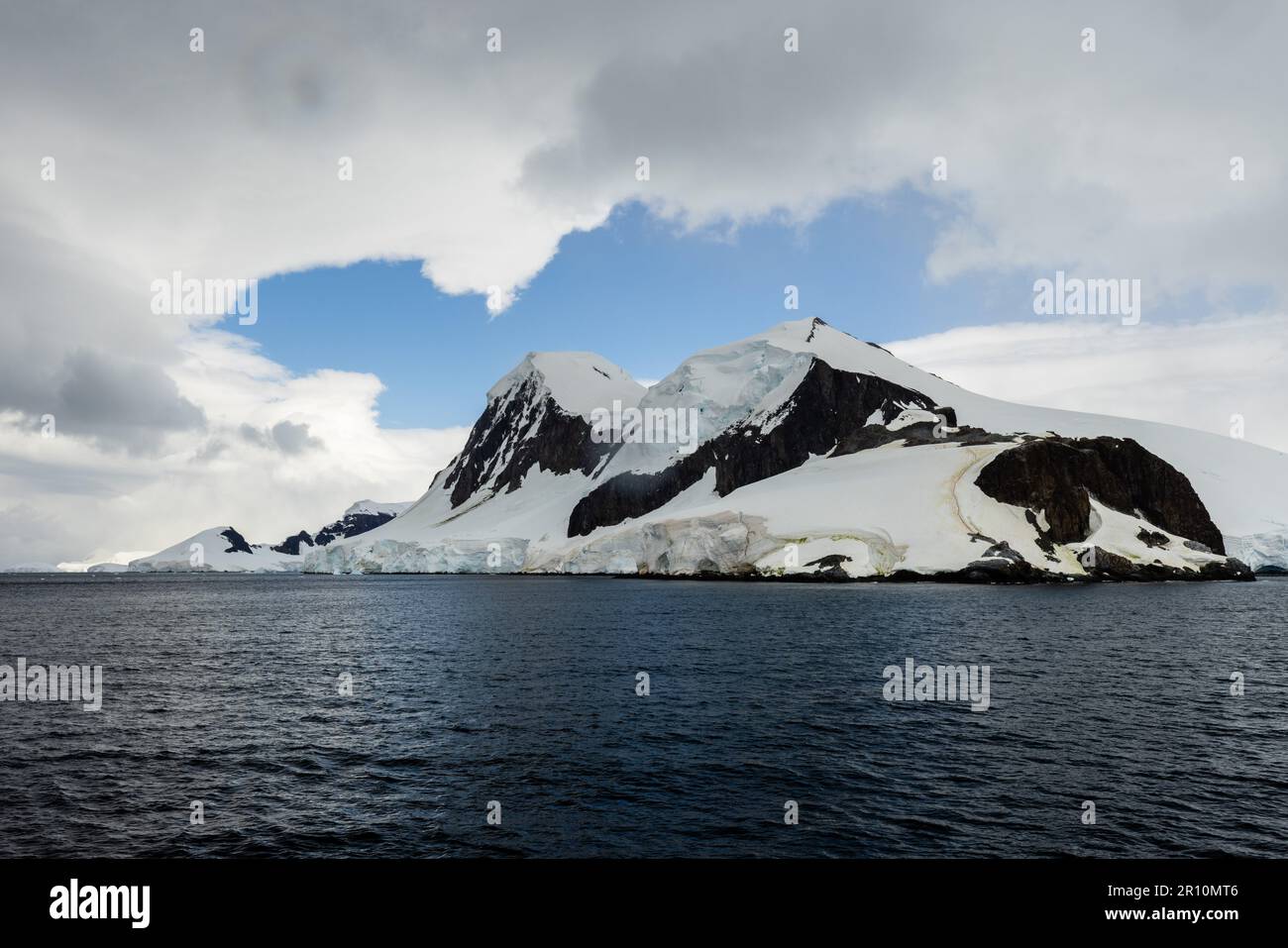 Cloud part around a coastal mountain in Antarctica Stock Photo - Alamy