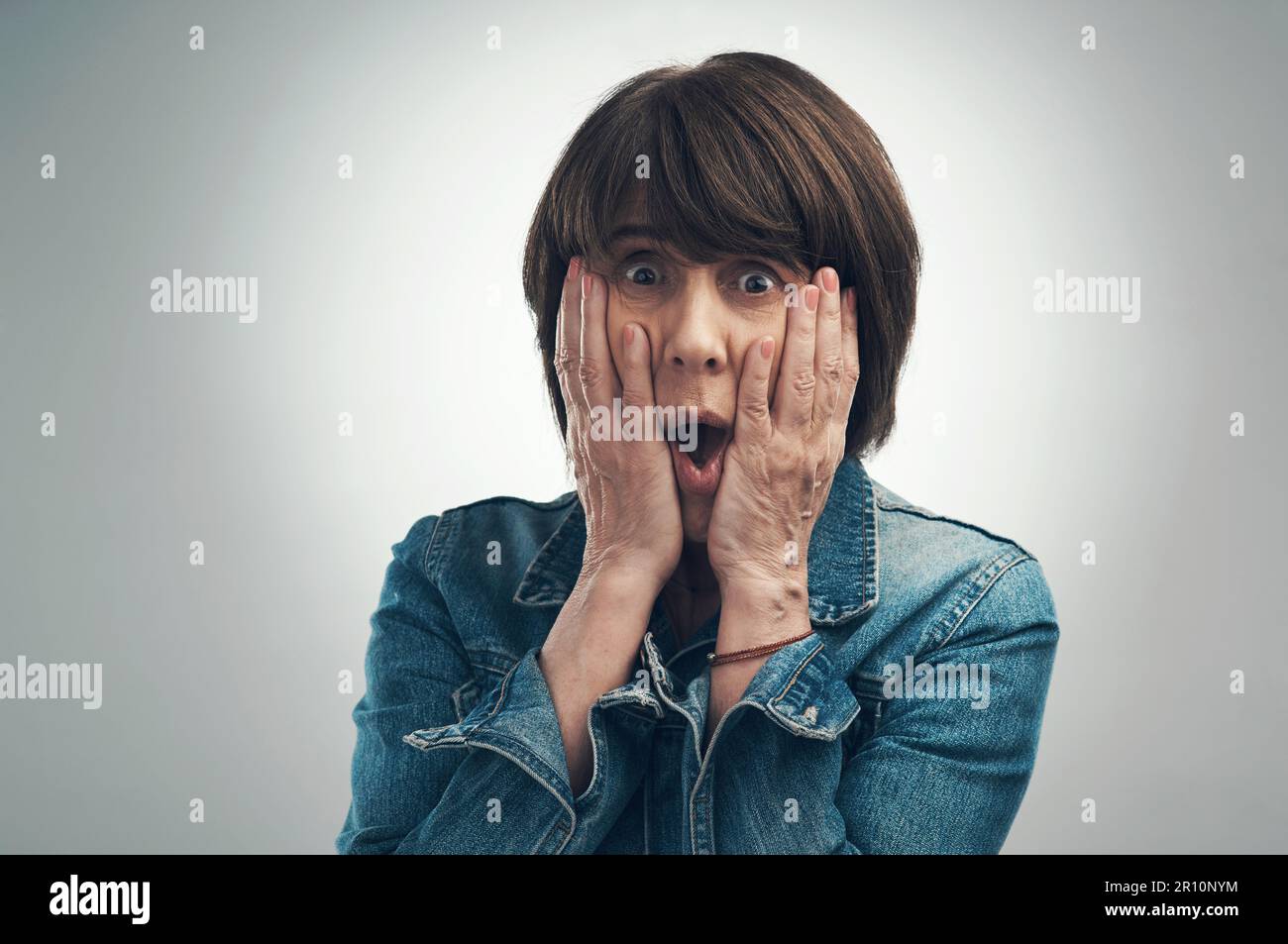 Feeling a bit fearful. Studio portrait of a senior woman looking ...