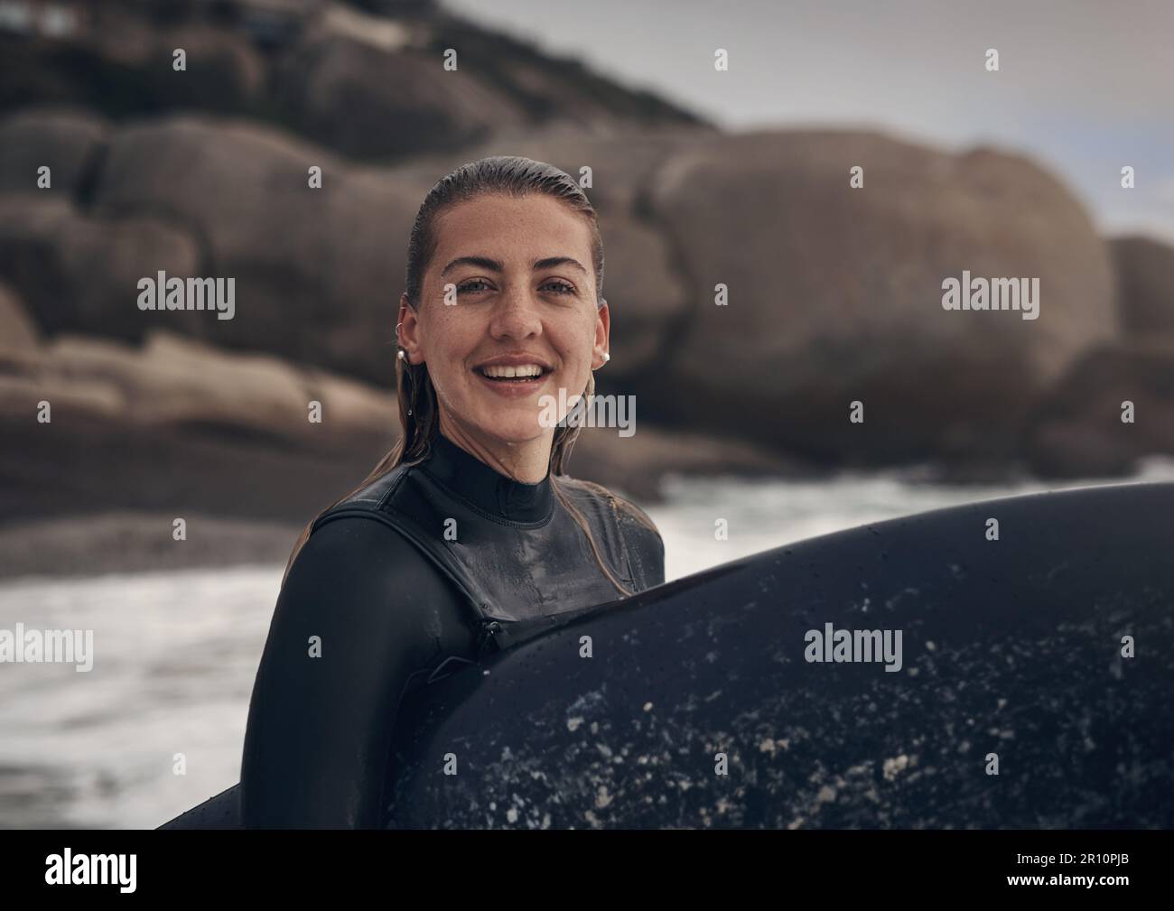 Ive never felt more alive. a young woman out surfing at the beach Stock ...