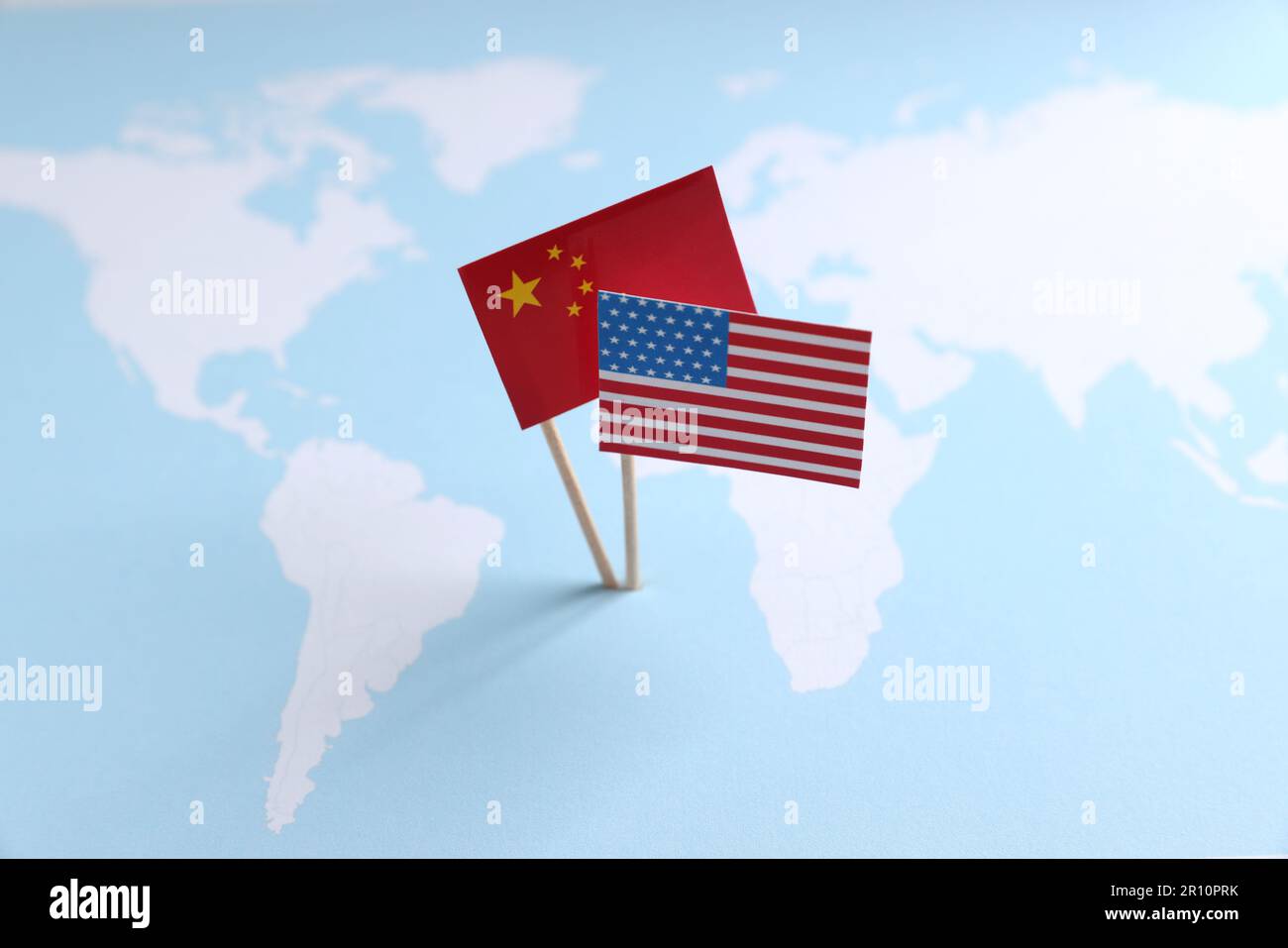 American and Chinese flags on world map. Trade war concept Stock Photo ...