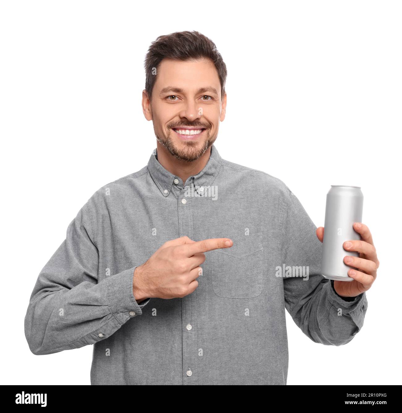 Happy man holding tin can with beverage on white background Stock Photo ...