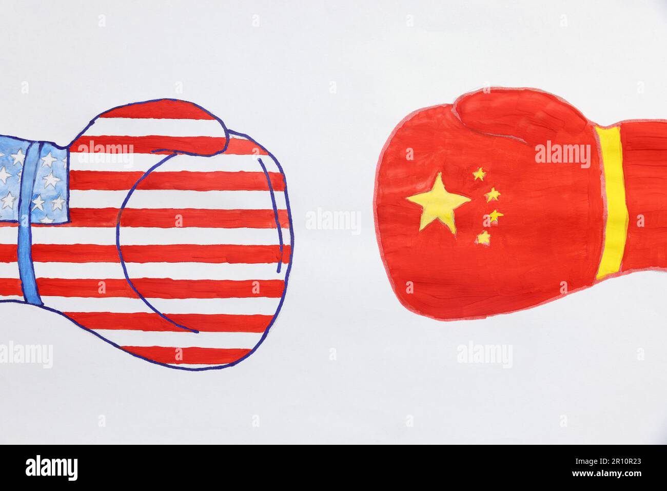 Boxing gloves with American and Chinese flags drawn on white paper, top ...