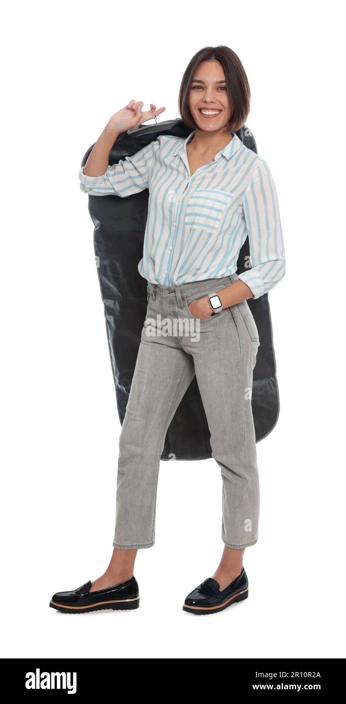 Woman holding garment cover with clothes on white background. Dry ...