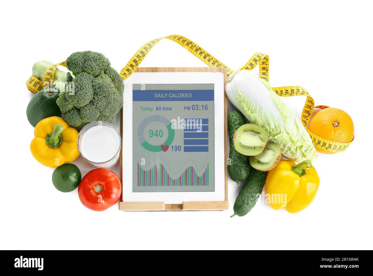 Tablet with weight loss calculator application, measuring tape and food ...
