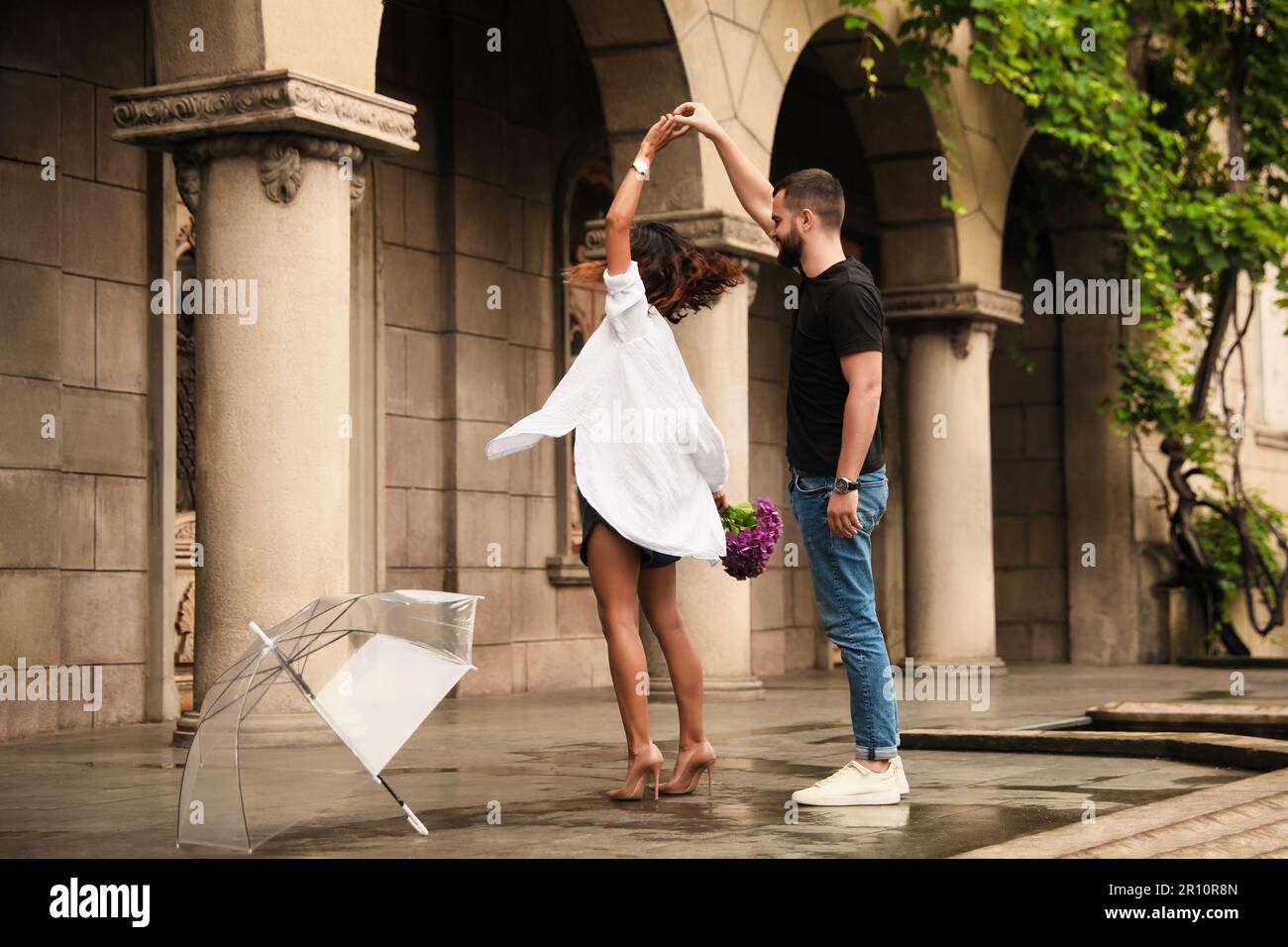 Dancing under rain hi-res stock photography and images - Alamy