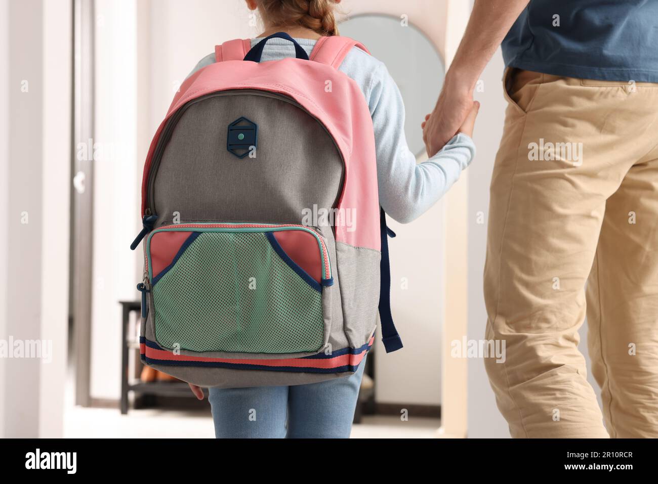 Little girl with father at home. Ready to go to school Stock Photo - Alamy