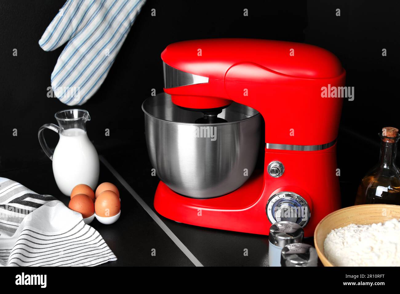Modern stand mixer and ingredients on countertop in kitchen Stock Photo ...