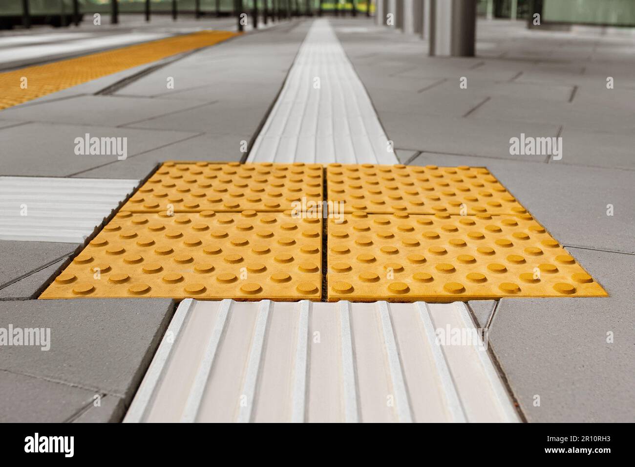 Tiles with tactile ground surface indicators, closeup view Stock Photo ...