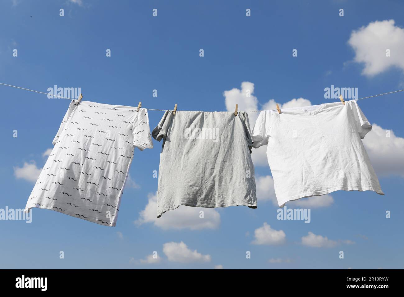 Washing line sky blowing hi-res stock photography and images - Alamy