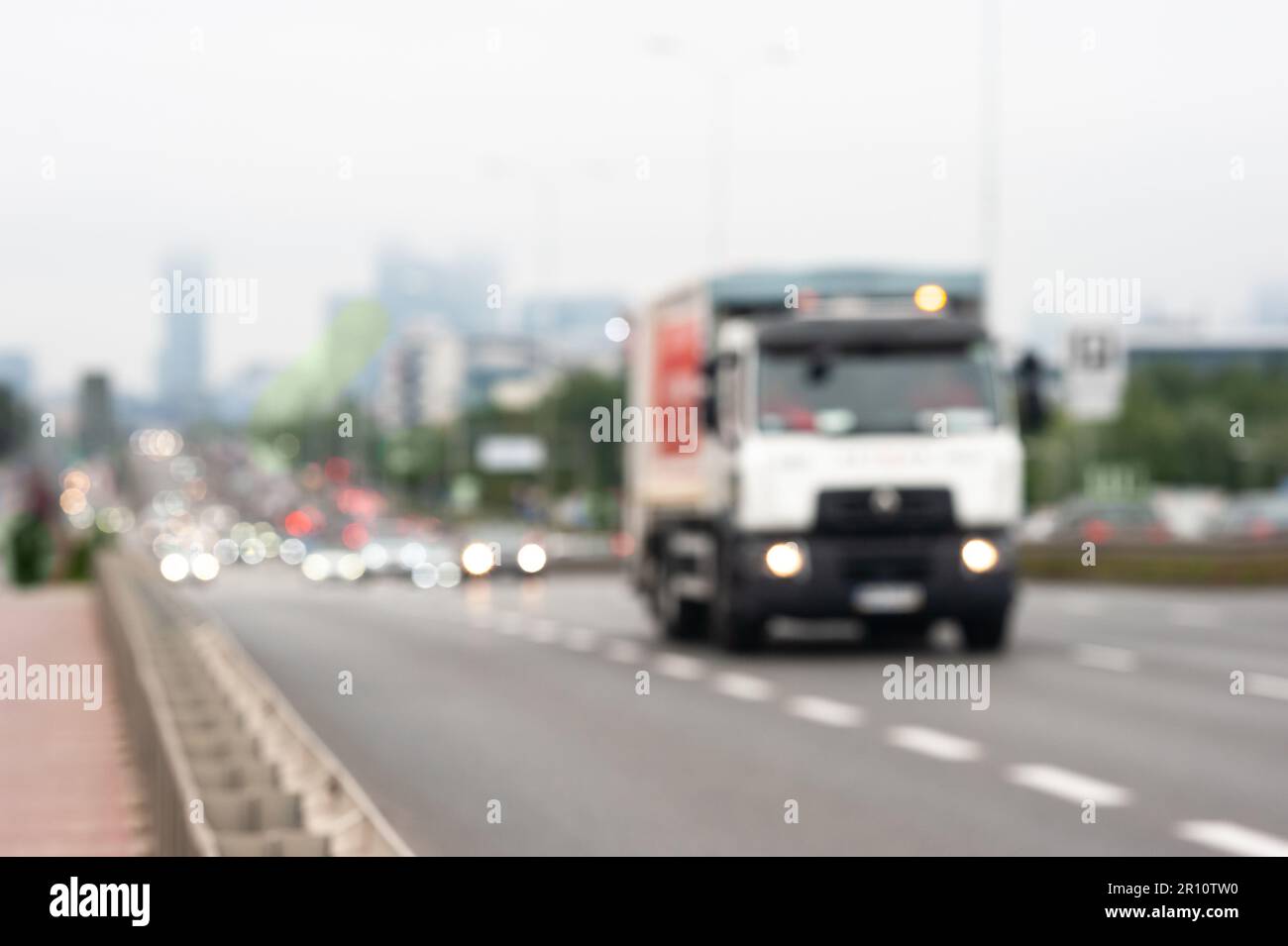 Blurred view of city road with cars Stock Photo - Alamy