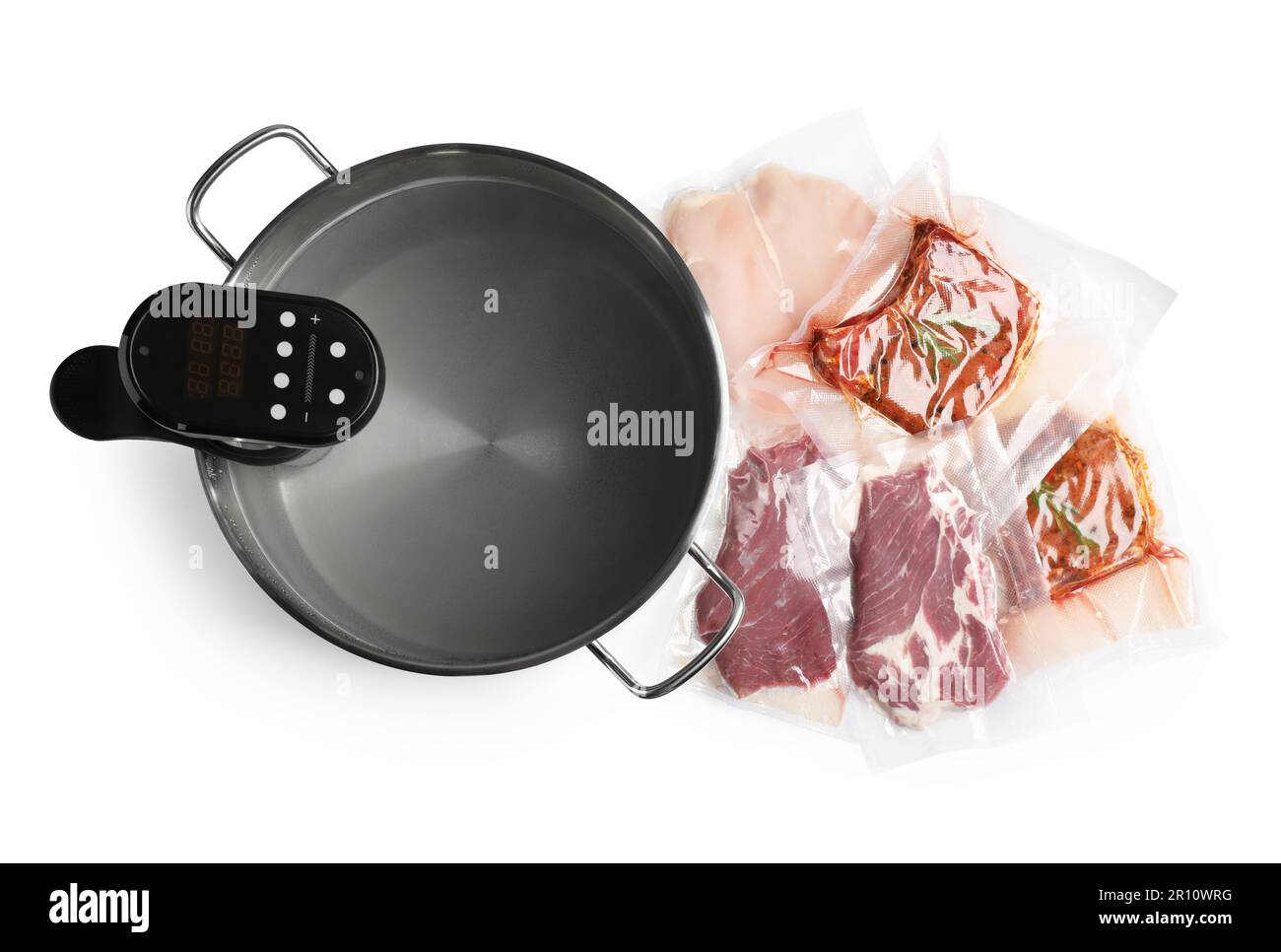 Thermal immersion circulator in pot and meat on white background, top ...