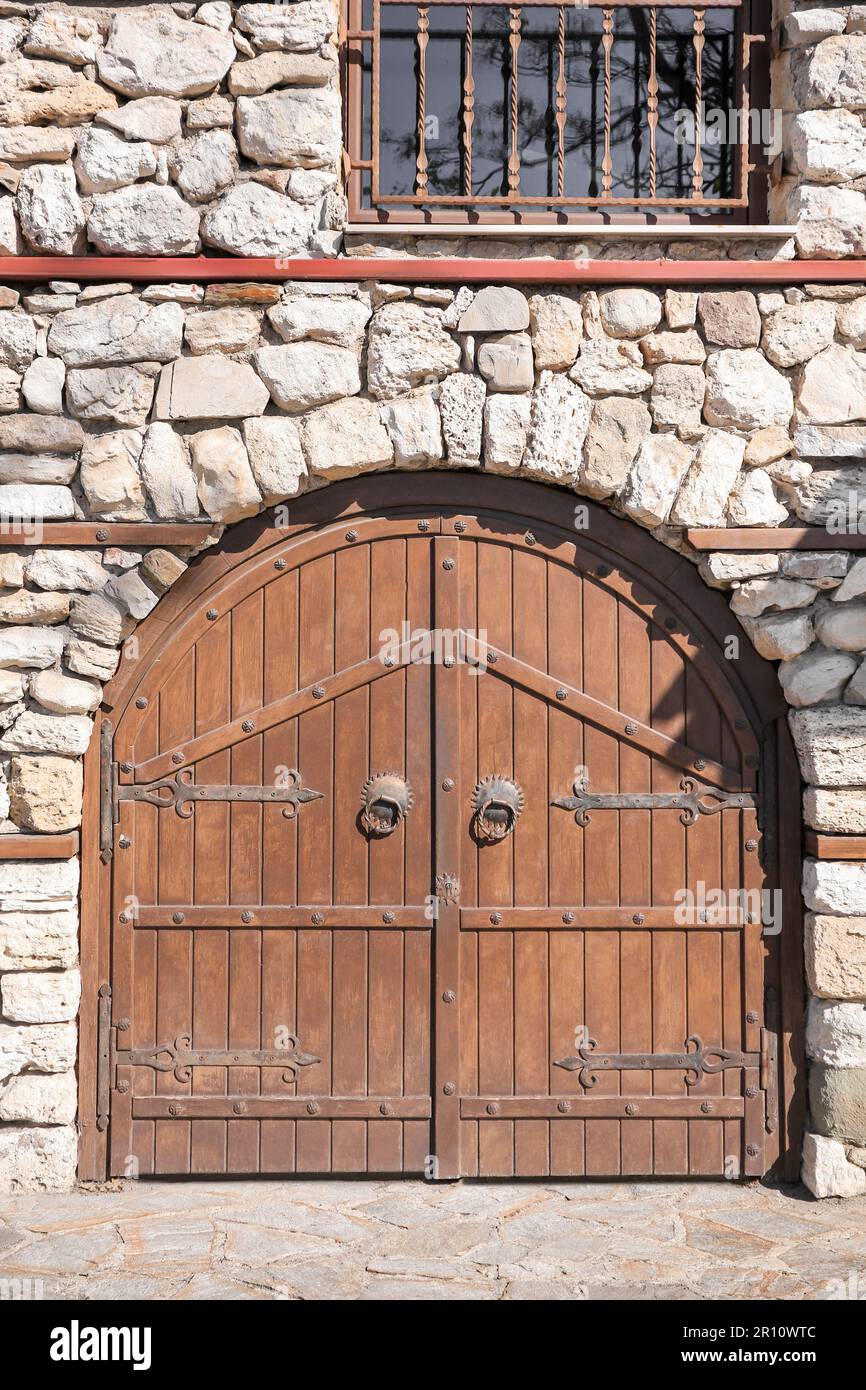 Entrance of house with beautiful old wooden gates Stock Photo - Alamy