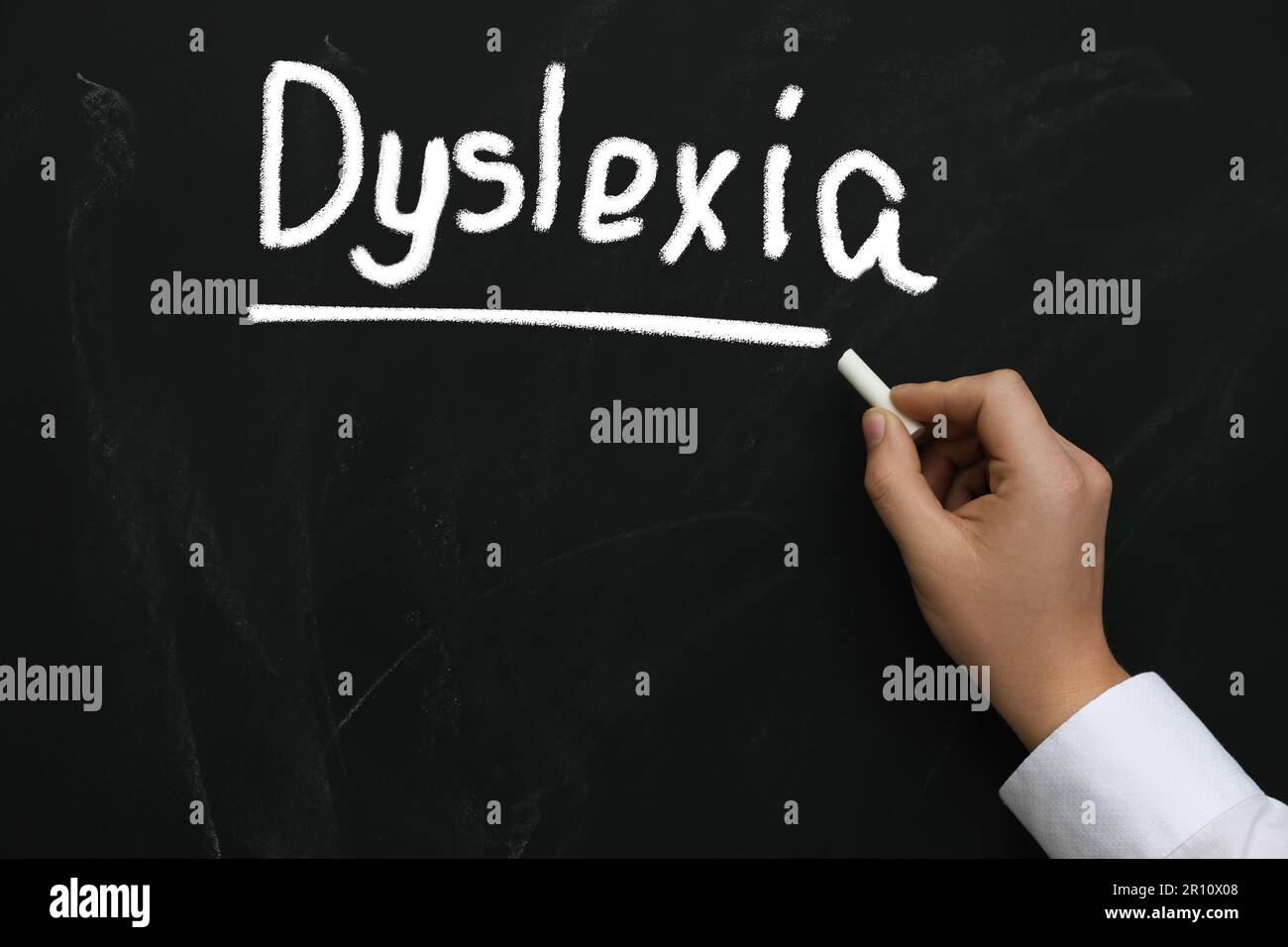 Man reading text on blackboard hi-res stock photography and images - Alamy