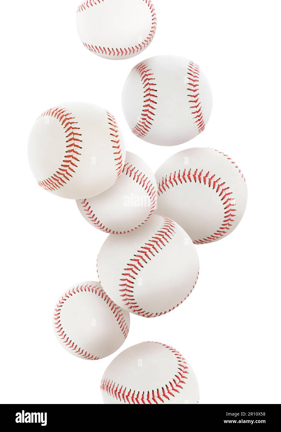 Many baseball balls falling on white background Stock Photo - Alamy
