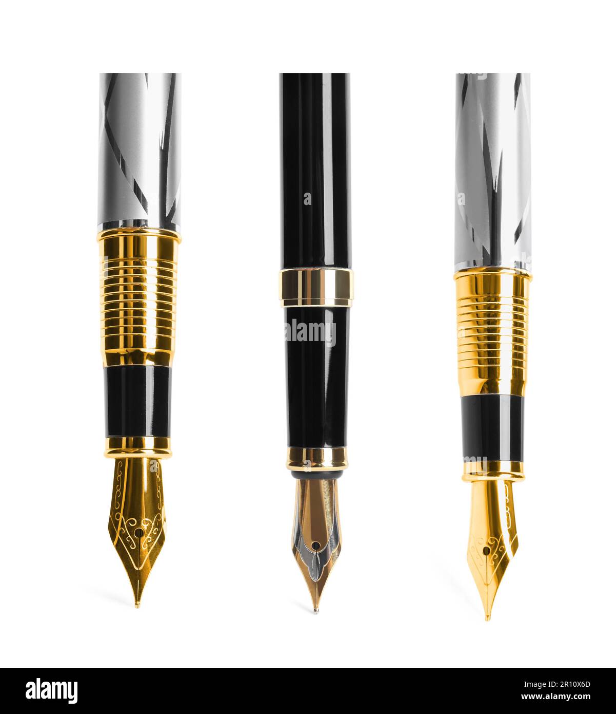 Set with different beautiful fountain pens on white background Stock ...