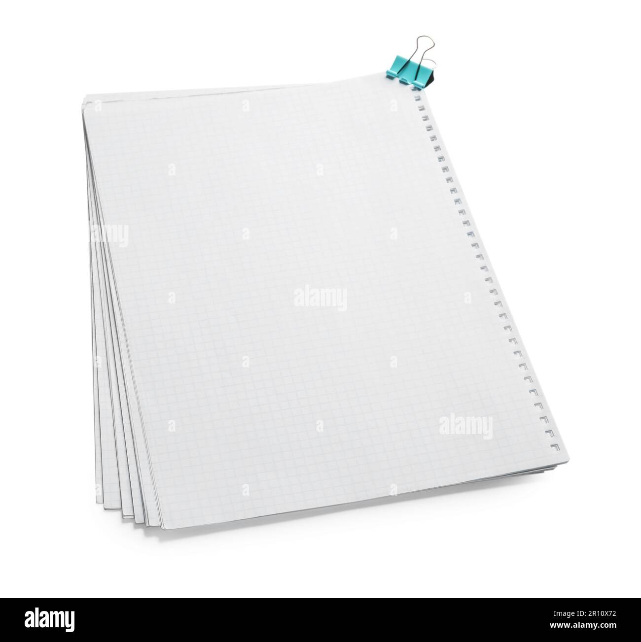 Stack of checkered paper sheets with binder clip on white background ...