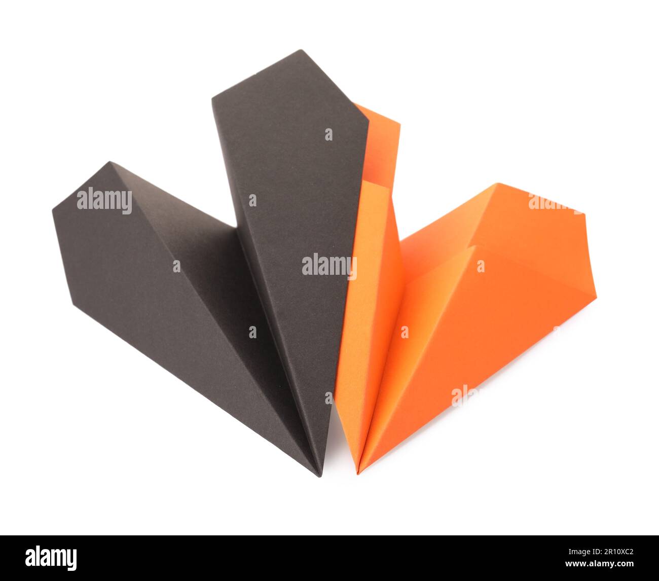 Handmade black and orange paper planes isolated on white Stock Photo ...